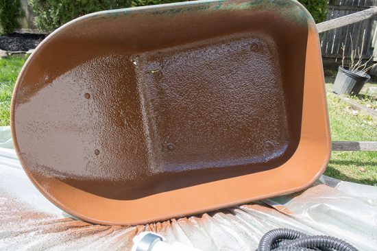 DIY Tipped Wheelbarrow Planter - The Honeycomb Home